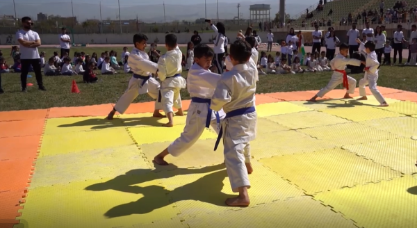 JINHAGENCY | Ji bo zarokên Helepçe Festîfala Lîstokên Rengan