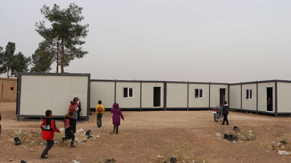 JINHAGENCY | Desteya Prewerdê ji bo zarokên koçber 10 dibistan vekir